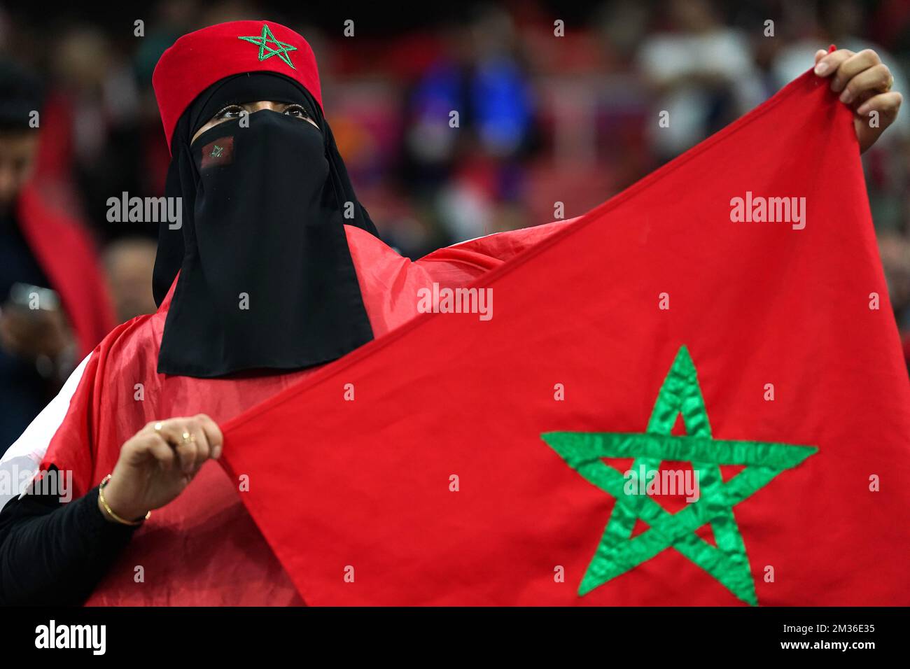 A Morocco fan holds up a flag before the FIFA World Cup Semi-Final ...