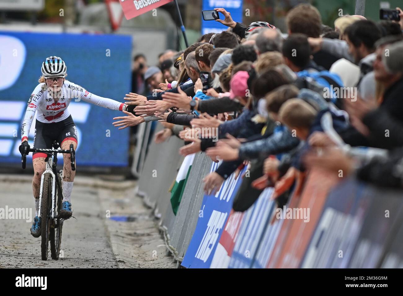 Dutch Puck Pieterse crosses the finish line at the women's elite race ...