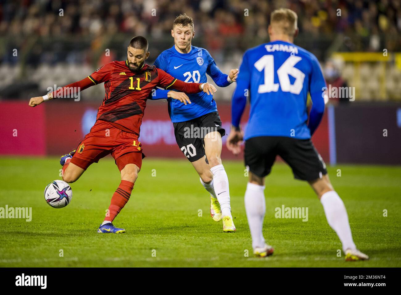 Belgium's Yannick Carrasco and Estonia's Markus Poom fight for the ball ...