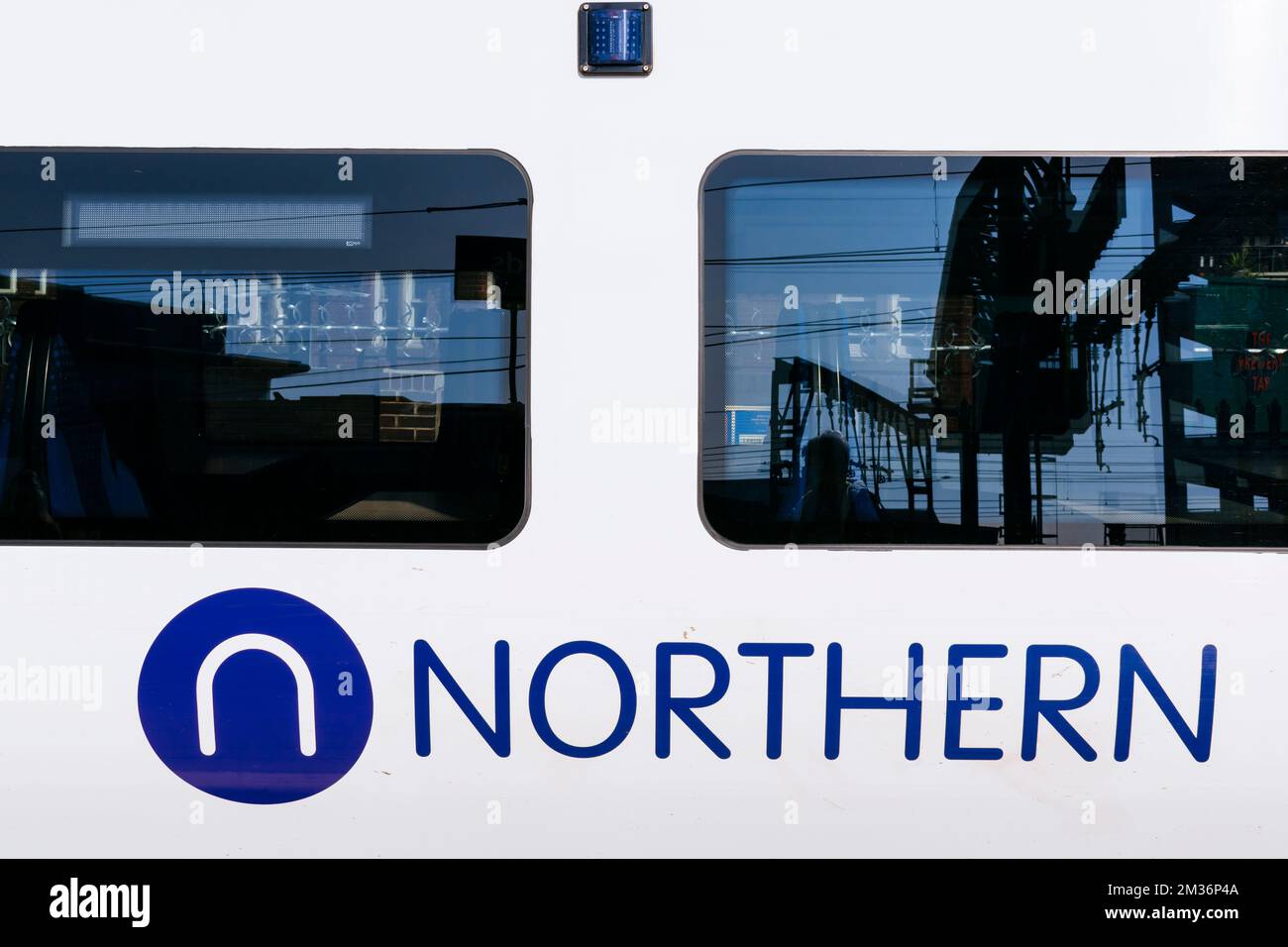 Northern train at Leeds station platforms. Leeds railway station, also ...