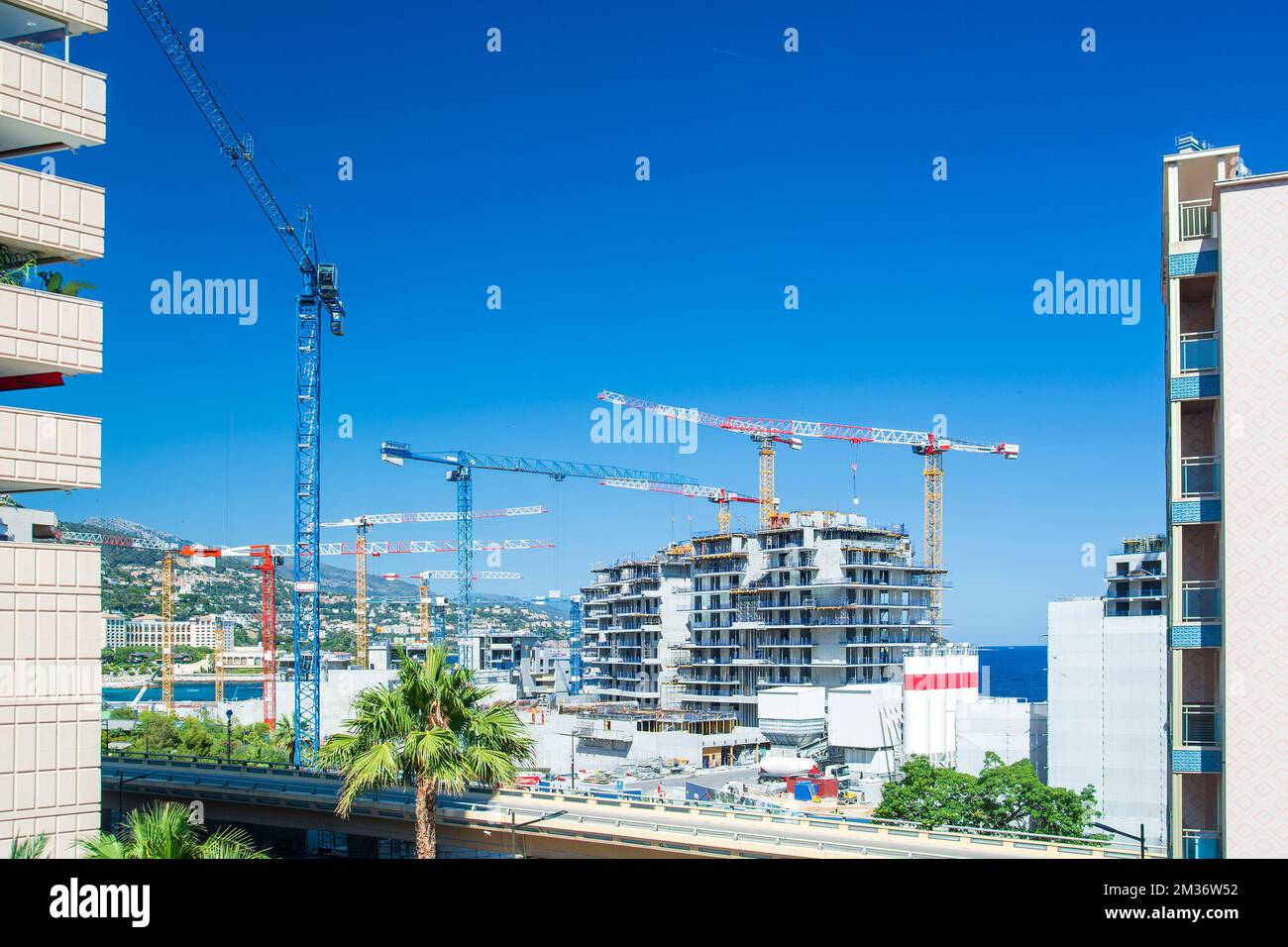 Monaco (Monte Carlo) cityscape with construction cranes and new ...