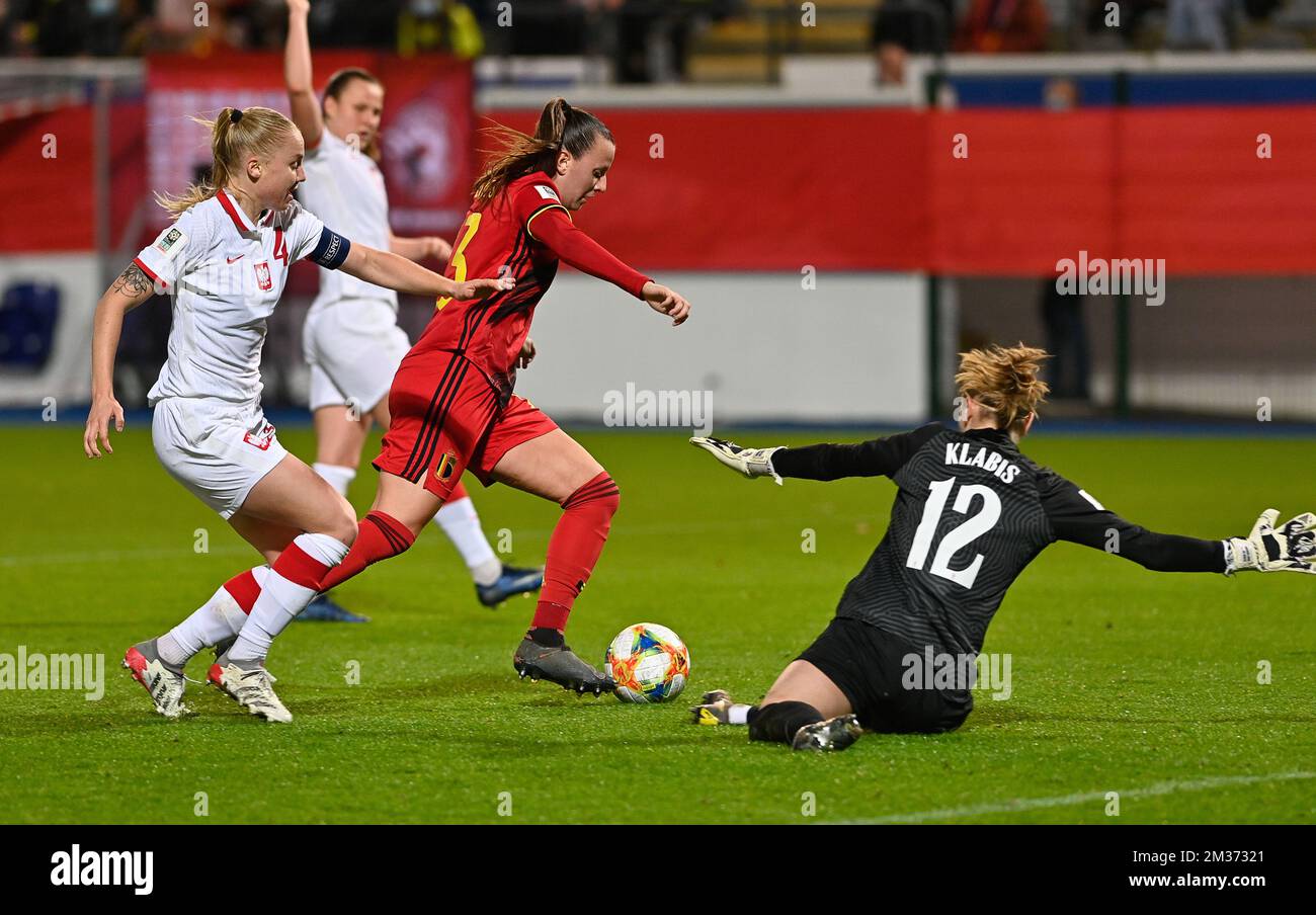 Belgium's Hannah Eurlings is going past , Poland's Paulina Dudek and ...