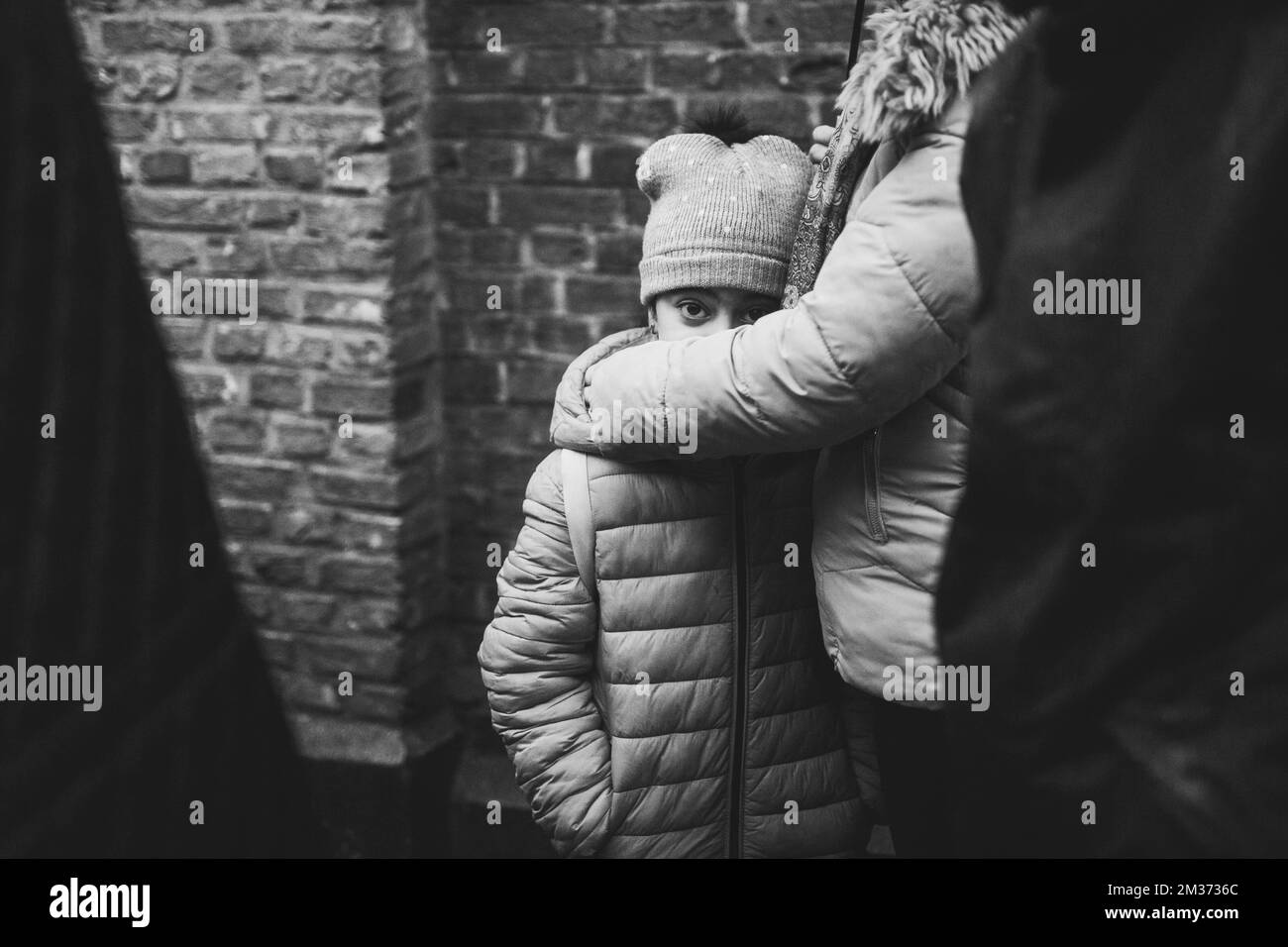 Illustration shows the conditions of waiting outside for asylum seekers ...