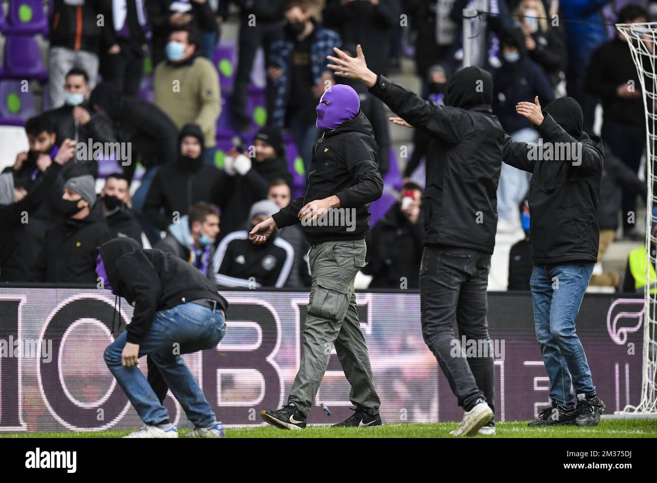 Beerschot's fans invade the pitch after a soccer match between ...