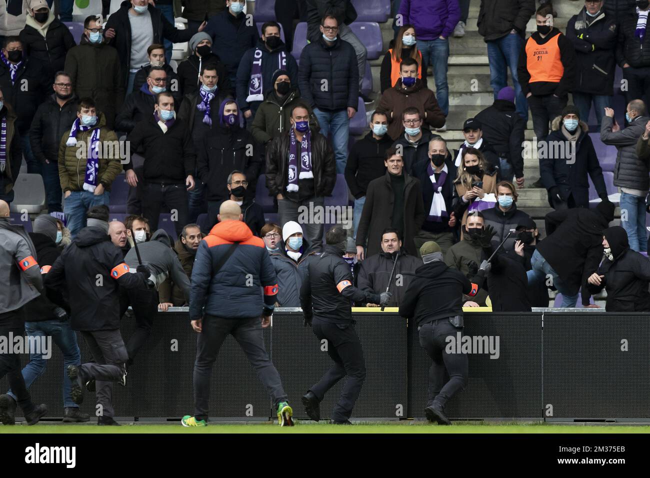 Beerschot's supporters and police pictured after a soccer match between ...