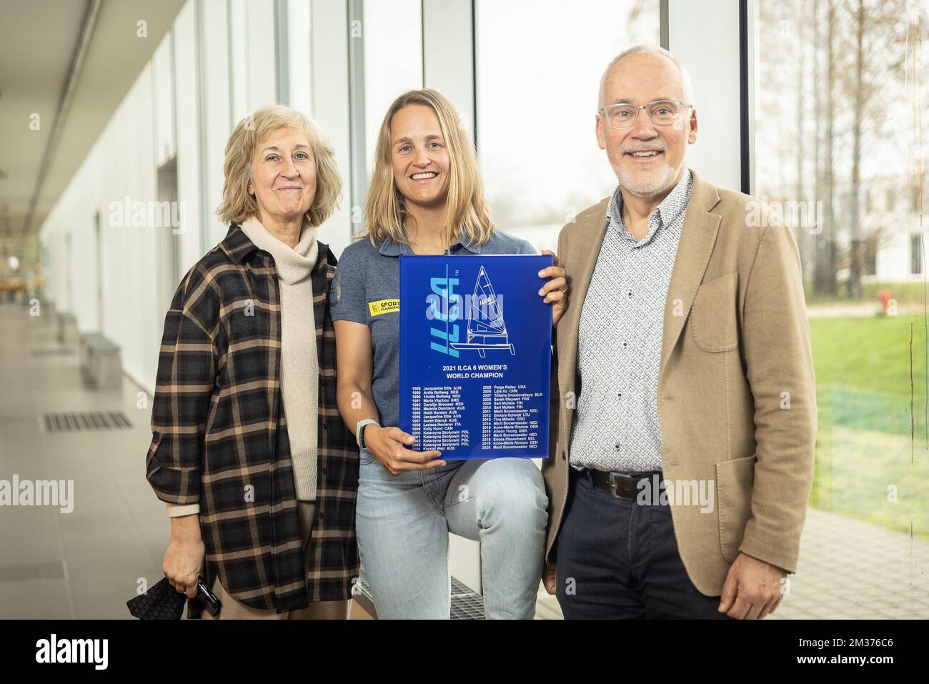 Belgian Sailor Emma Plasschaert poses with her parents after a press ...