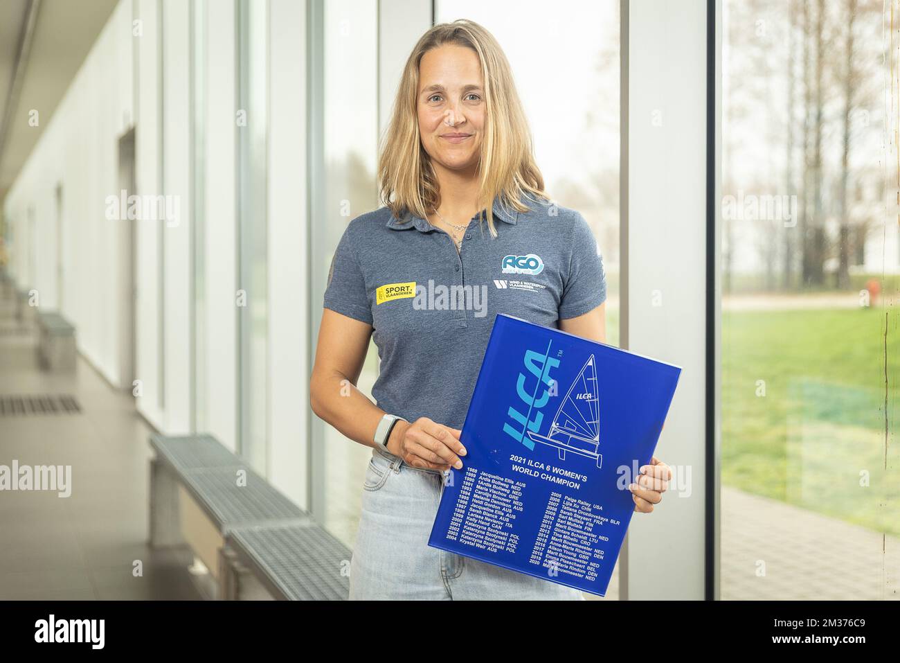 Belgian Sailor Emma Plasschaert poses for the photographer after a ...