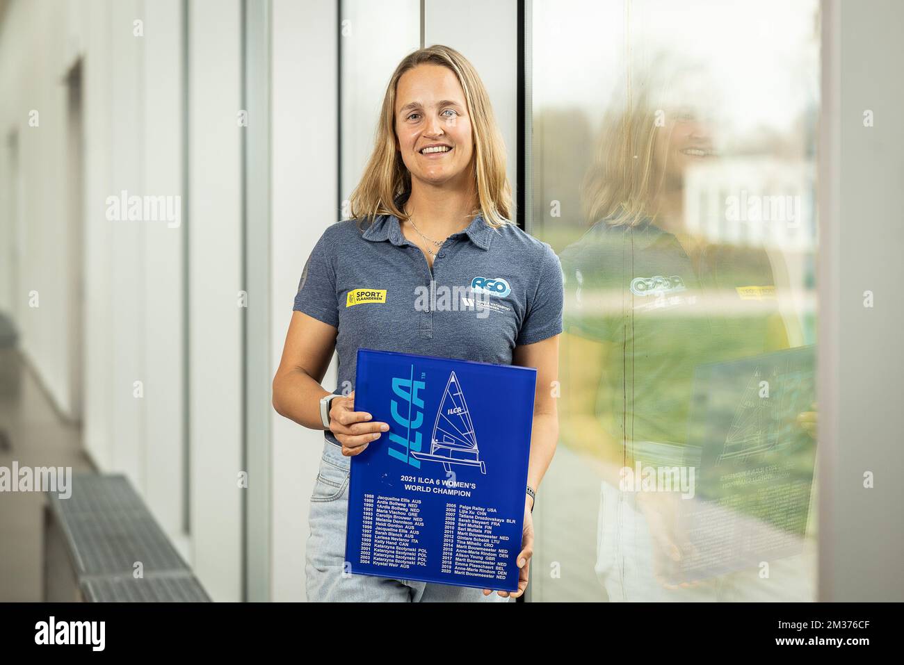 Belgian Sailor Emma Plasschaert poses for the photographer after a ...