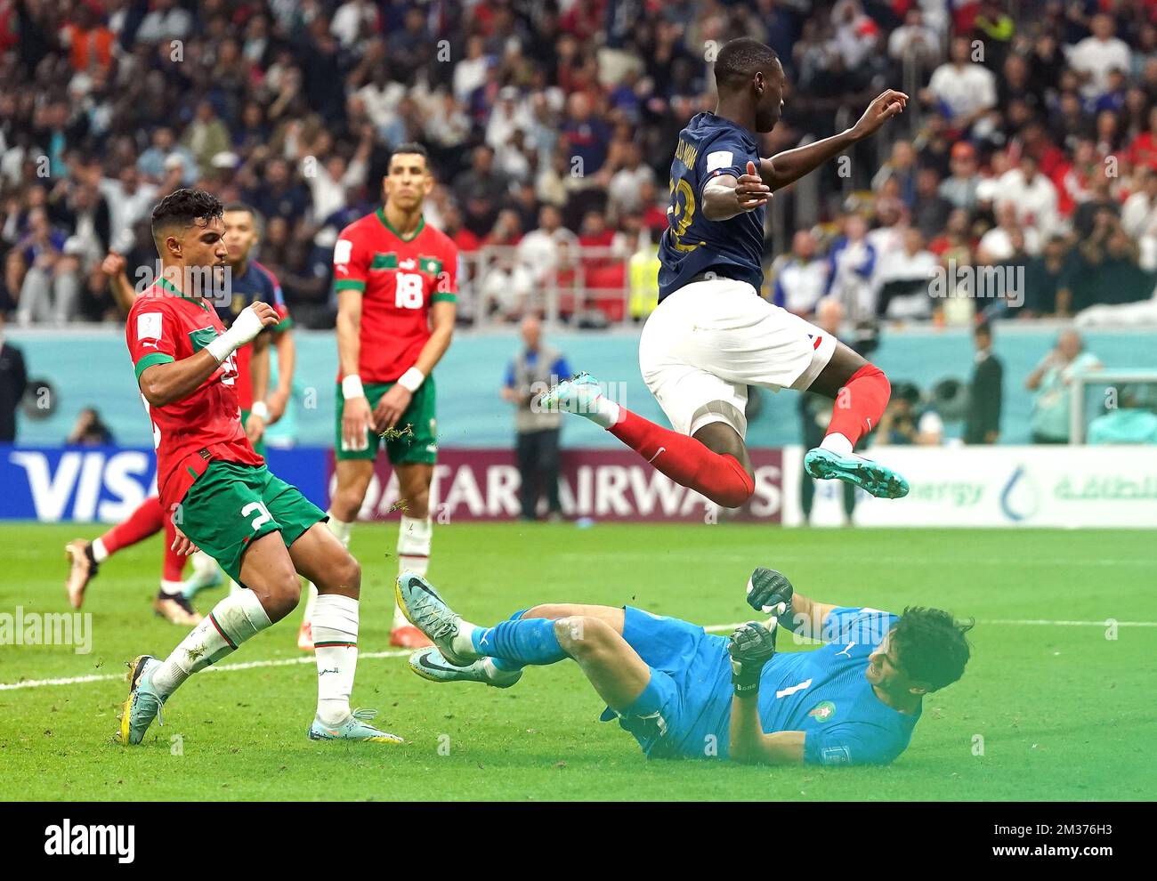 France's Randal Kolo Muani (right) scores their side's second goal of ...