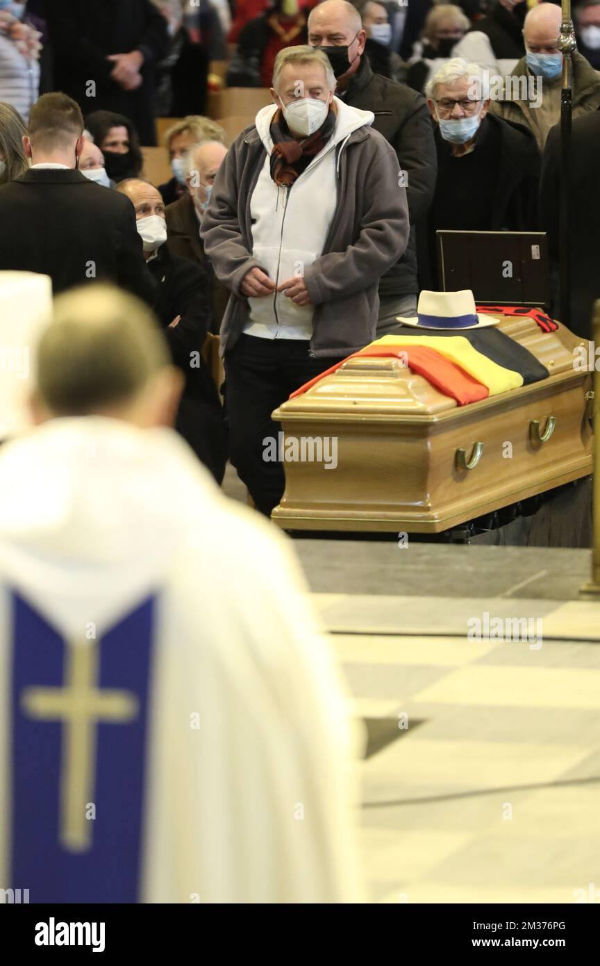 Singer Jean-Luc Fonck passes by the coffin at the funeral service for ...