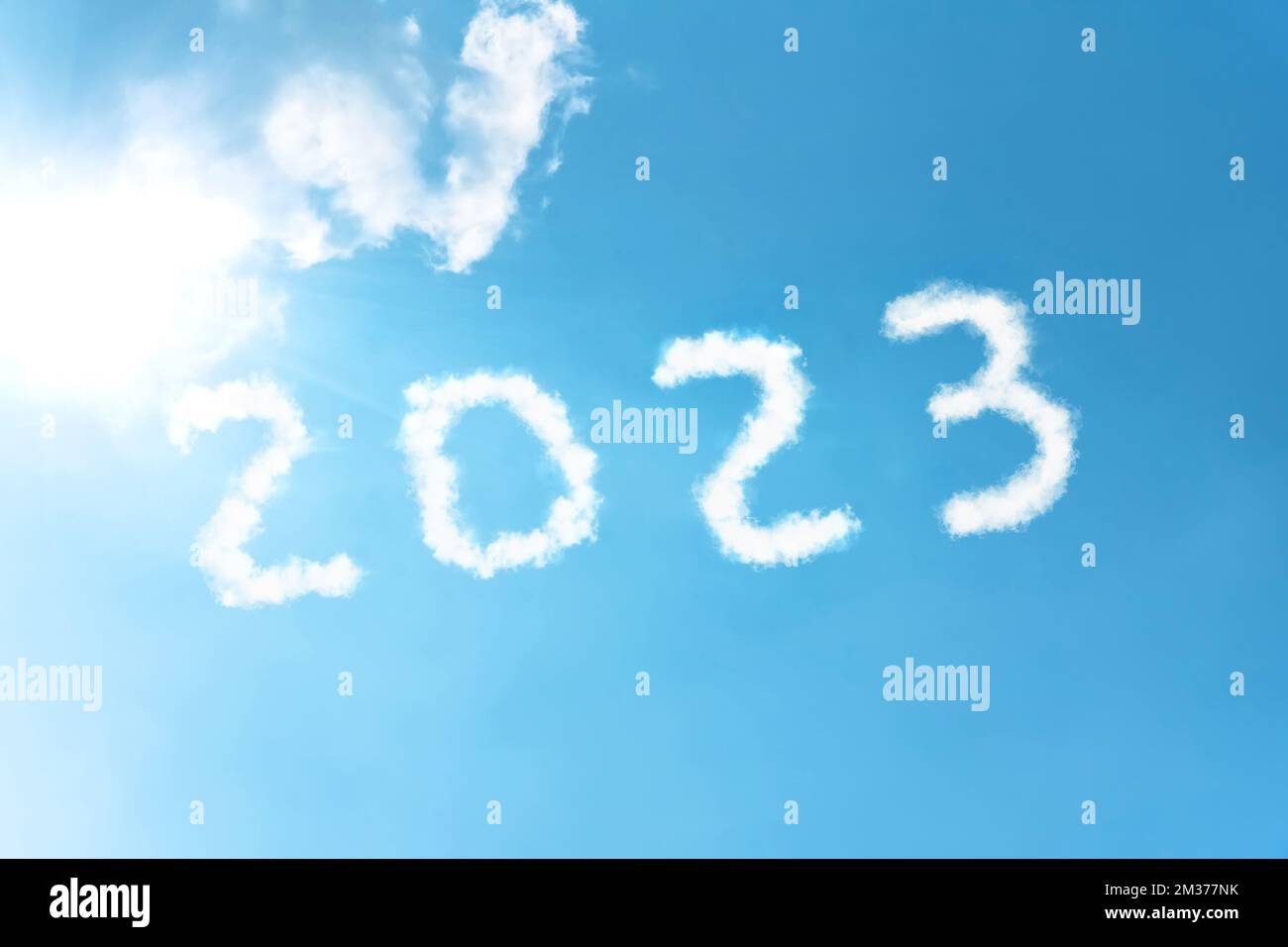 Numbers 2023 symbol inscription on a background of blue sky from white ...
