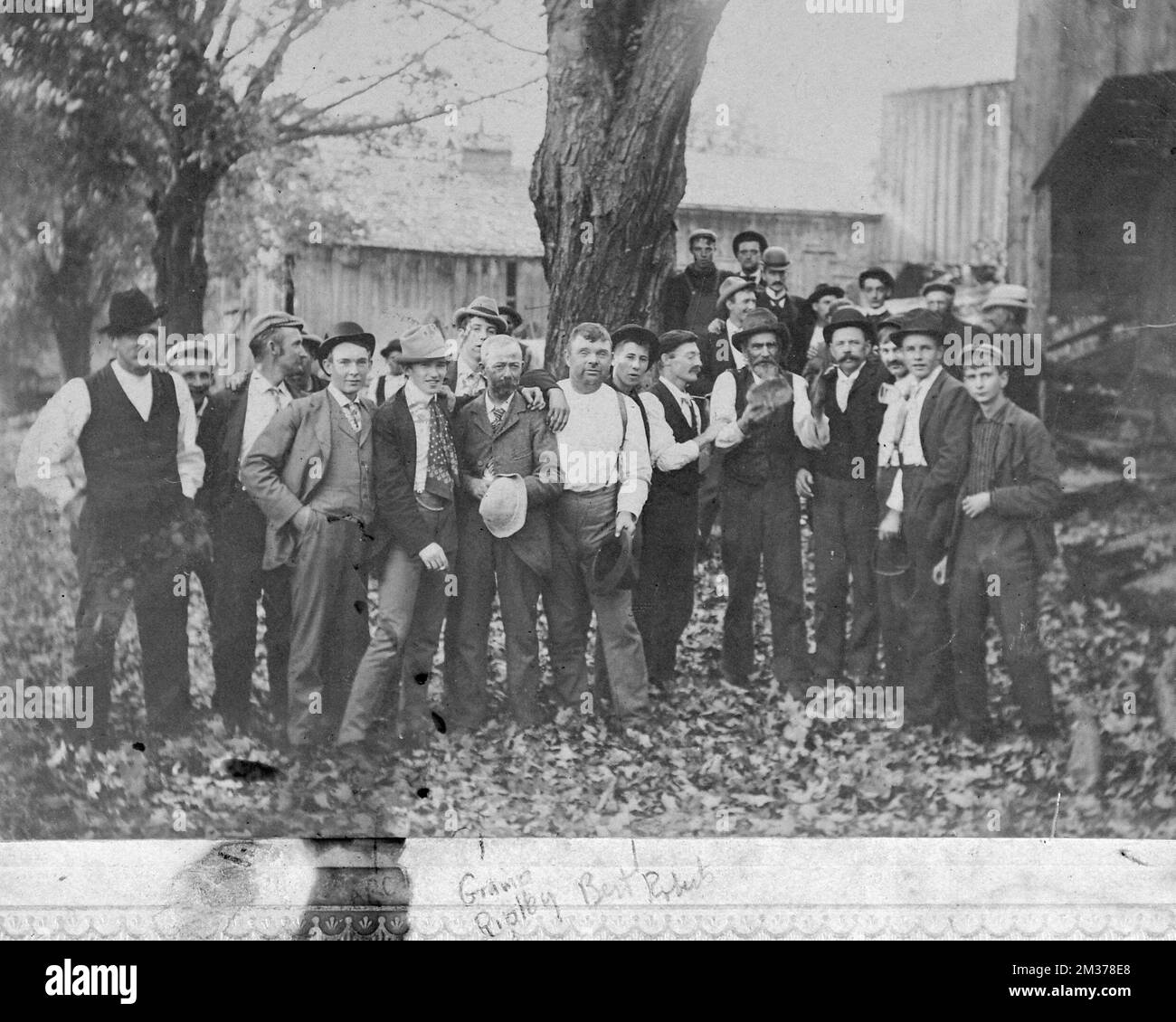 Group of Granville men , Musical instrument industry Stock Photo - Alamy