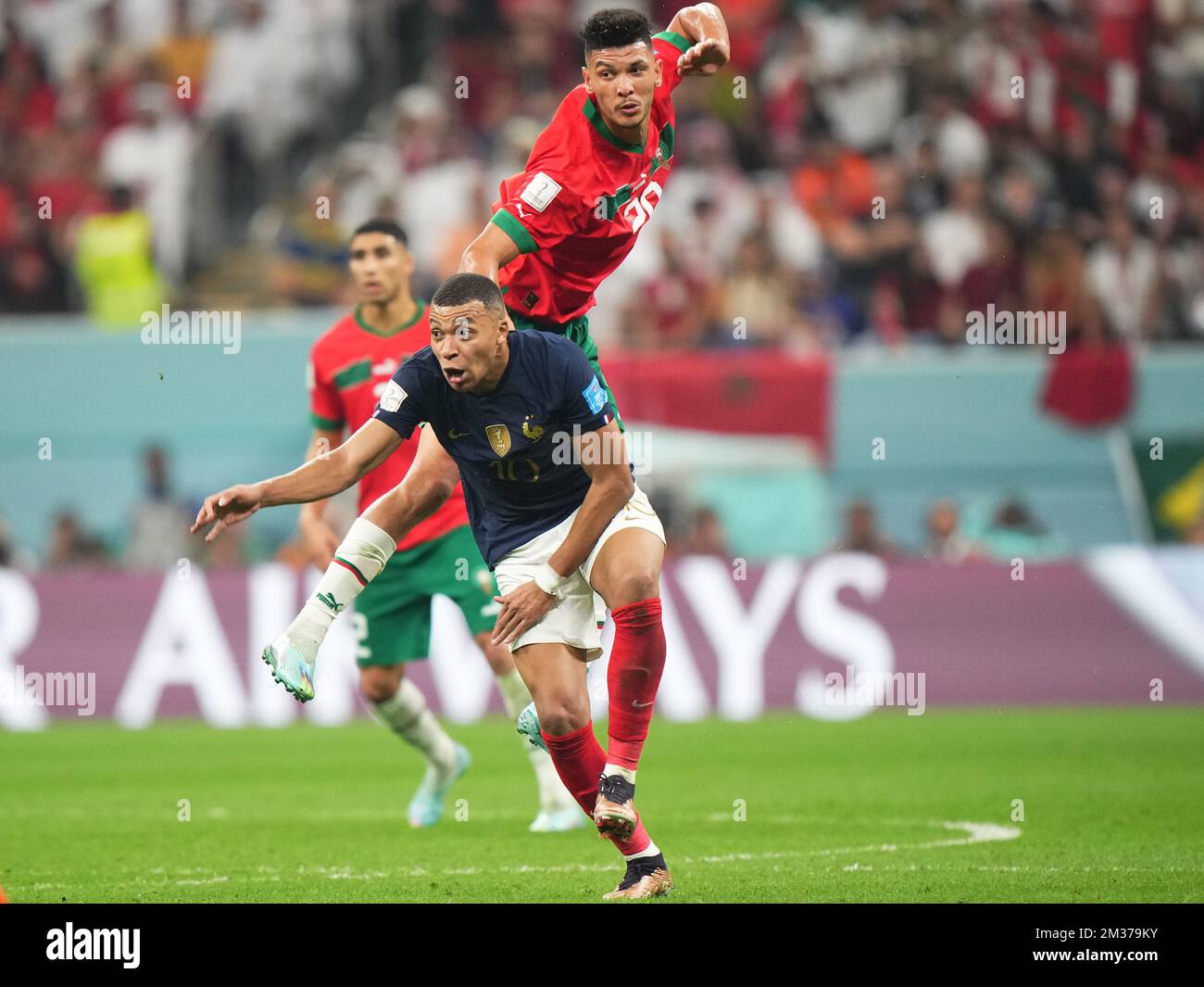 Kylian Mbappe of France and Achraf Dari of Morocco during the FIFA ...