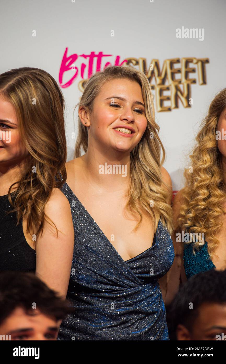 Part of the cast of the movie Bittersweet Sixteen is seen on the red ...