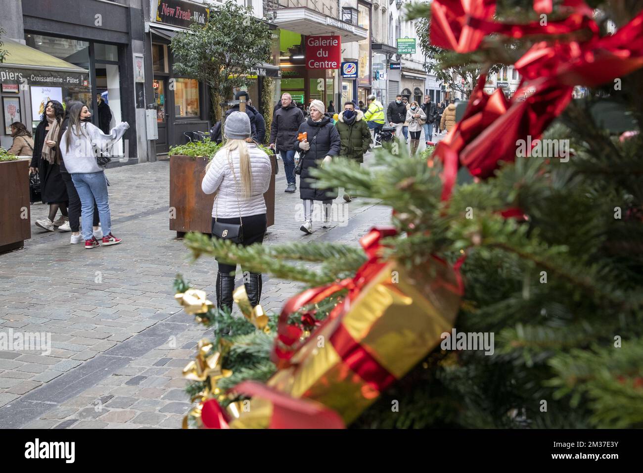 People go Christmas shopping in the city center of Brussels, Thursday ...