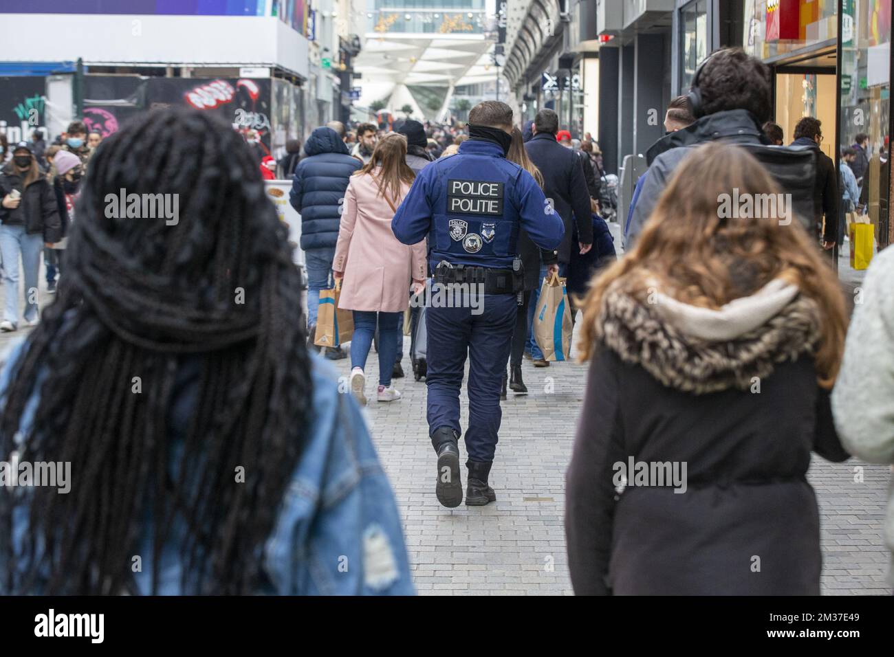 People go Christmas shopping in the city center of Brussels, Thursday ...