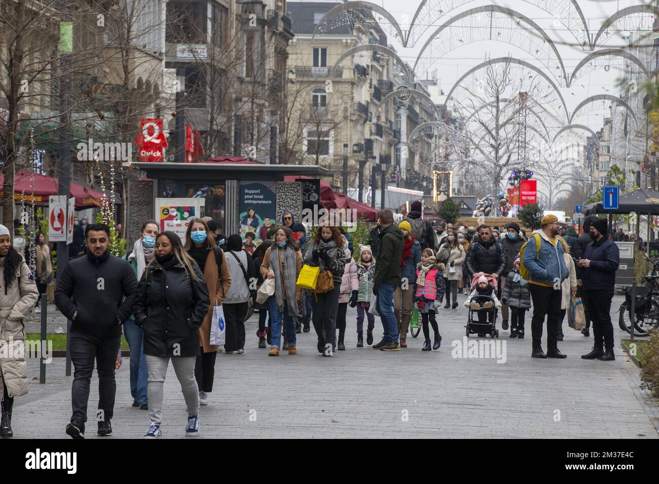 People go Christmas shopping in the city center of Brussels, Thursday ...