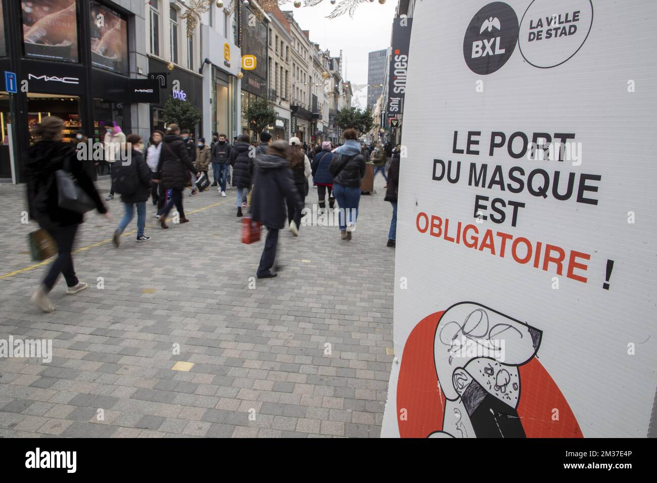 People go Christmas shopping in the city center of Brussels, Thursday ...