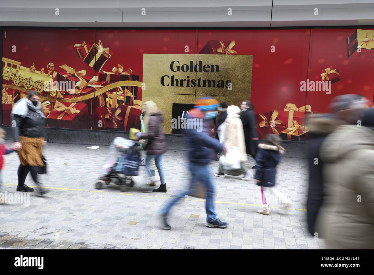 People go Christmas shopping in the city center of Brussels, Thursday ...