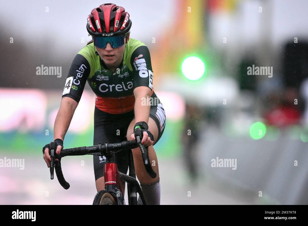 Belgian Kiona Crabbe crosses the finish line at the women's elite and ...