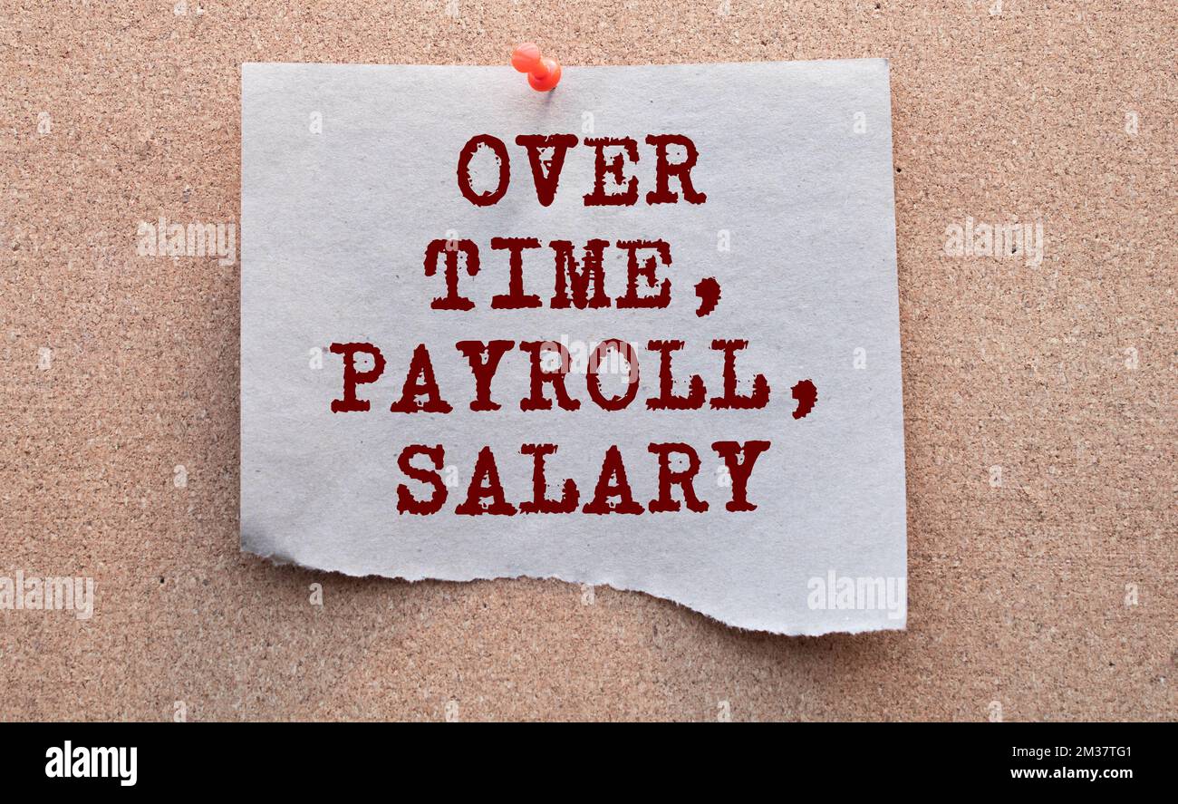 Over time. text on white paper on wood table background Stock Photo - Alamy