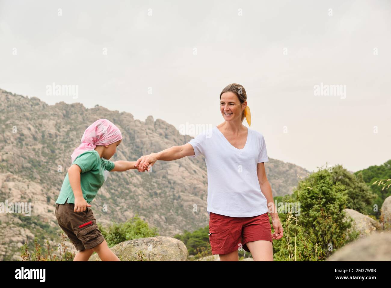 Mother and child with cancer playing in nature Stock Photo - Alamy