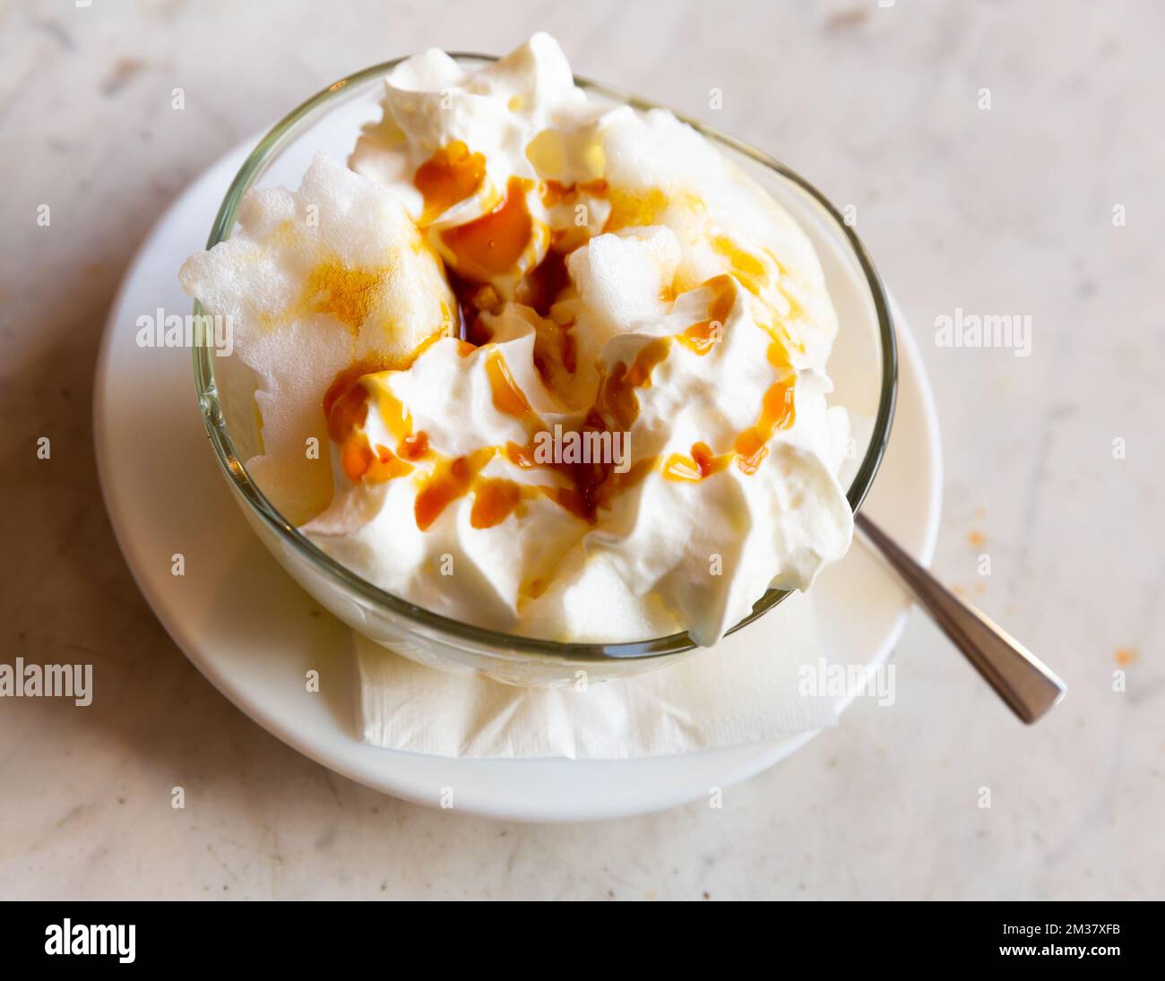 French dessert - floating island served in glass bowl Stock Photo - Alamy