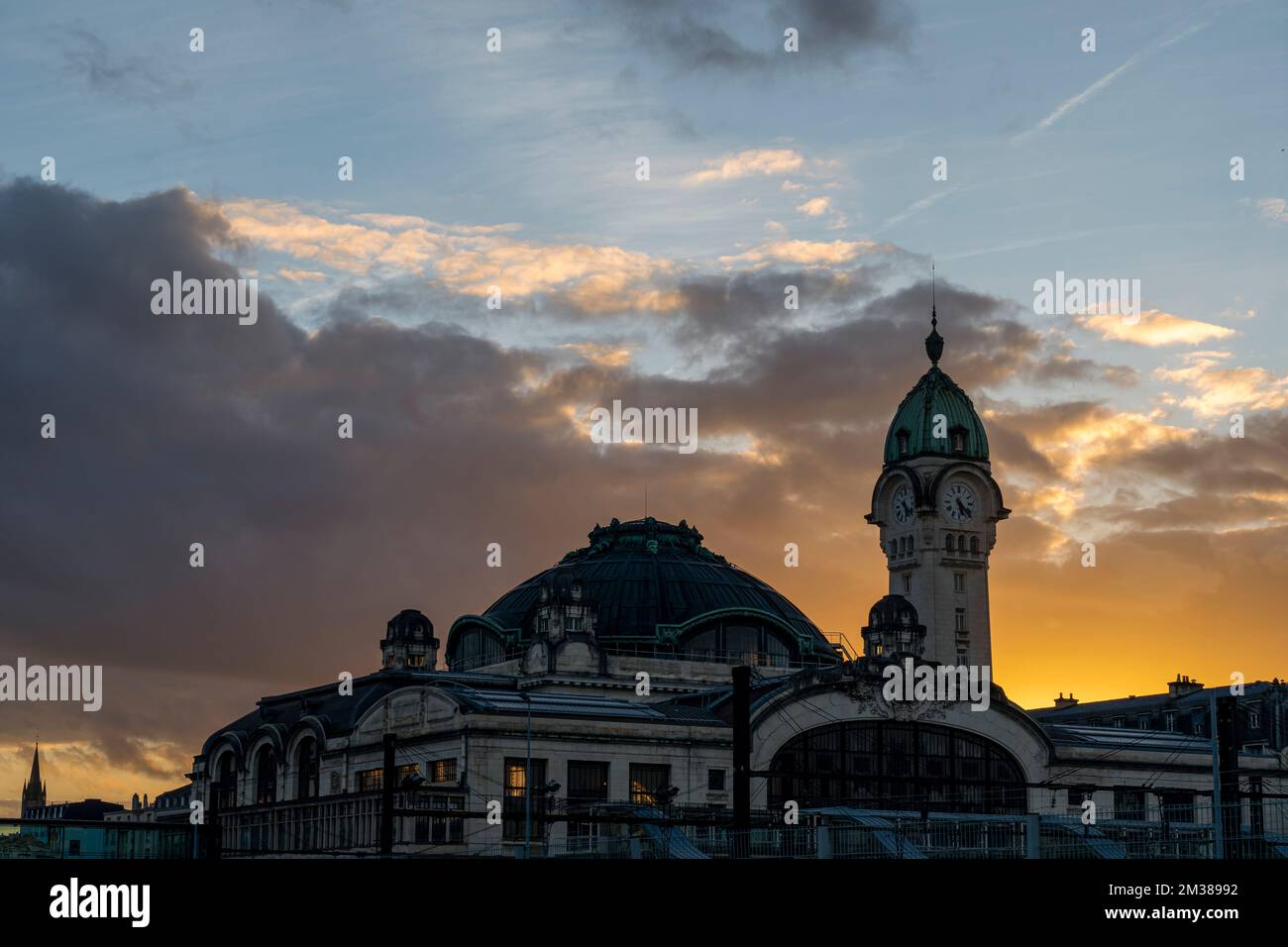 Limoges Benedictins Train station with sun behind tower, the most ...