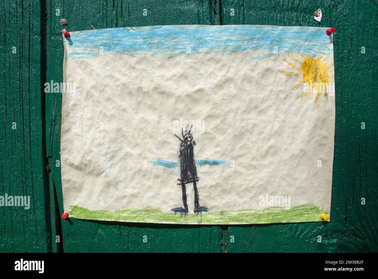 children's drawing, little man on paper Stock Photo - Alamy