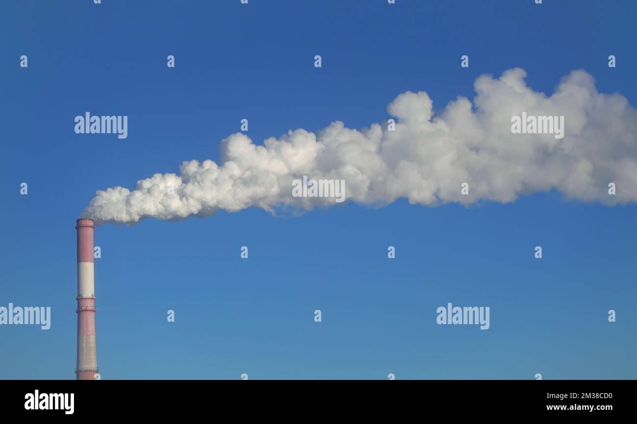 Chimney of factory and clear blue sky, environmental pollution Stock ...