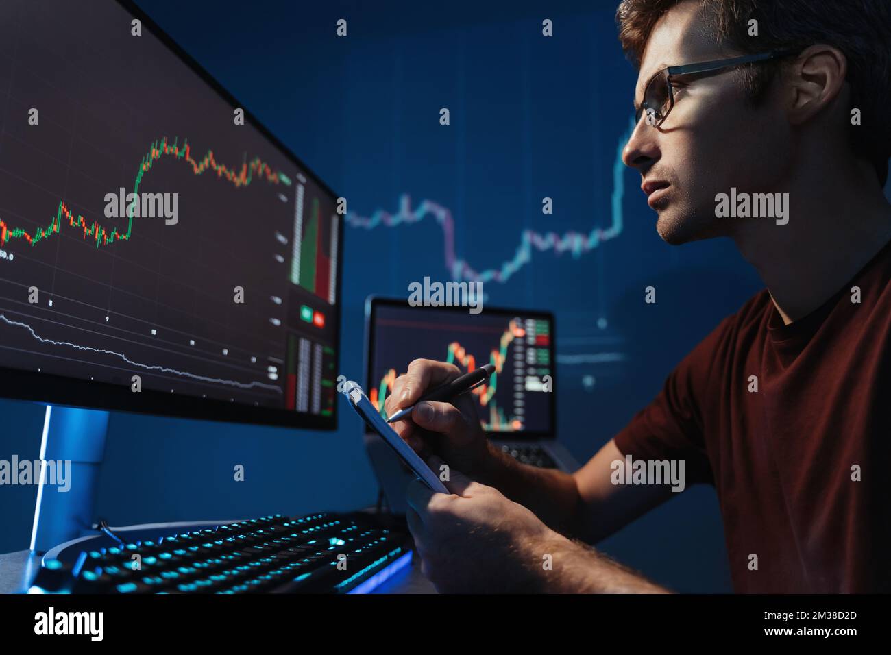 Closeup of intelligent crypto trader inventing successful trading ...
