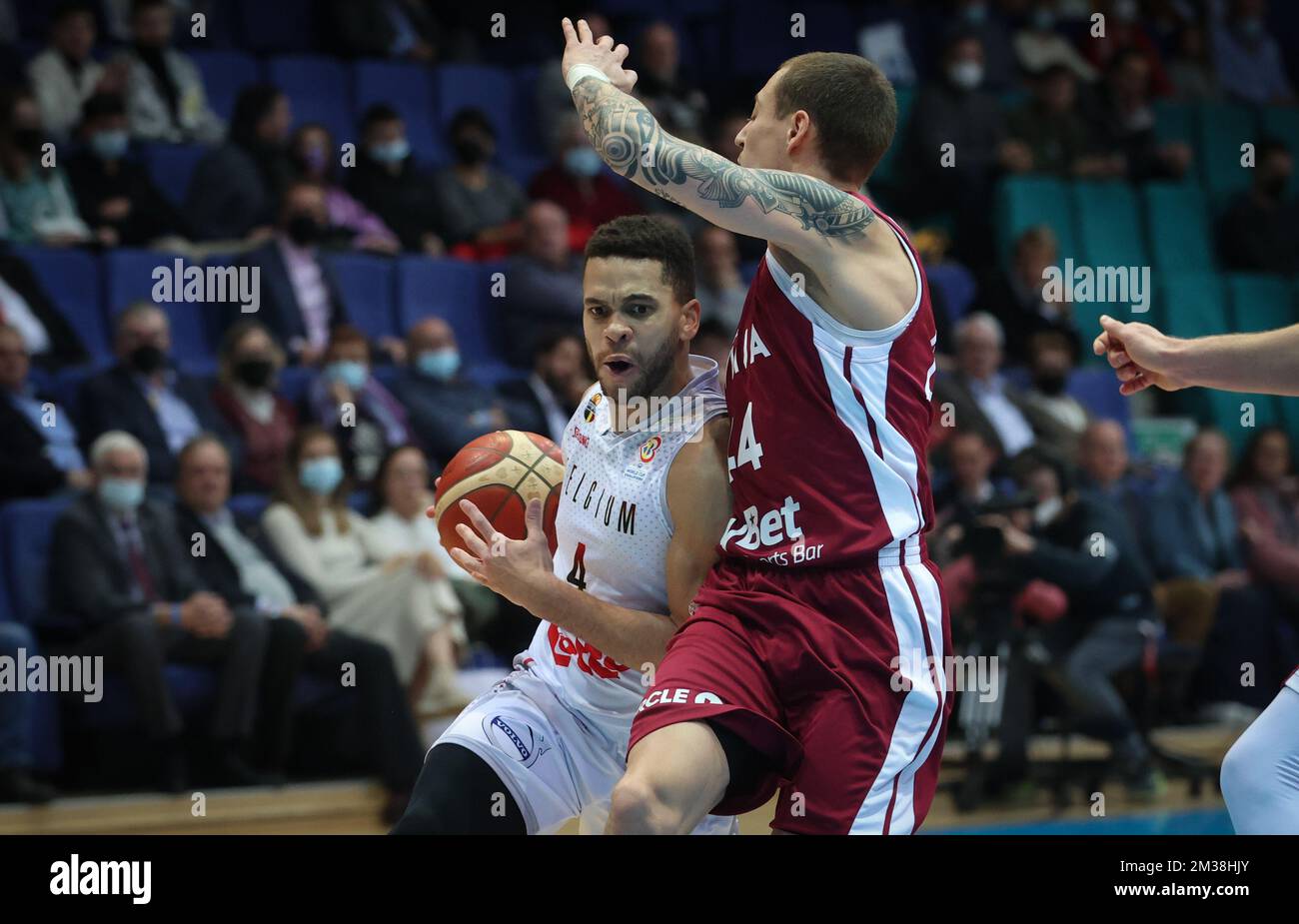 Belgium's Emmanuel Lecomte and Latvian Andrejs Grazulis fight for the ...