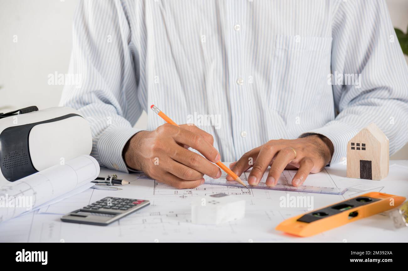 Architectural building design and construction plans with blueprints ...