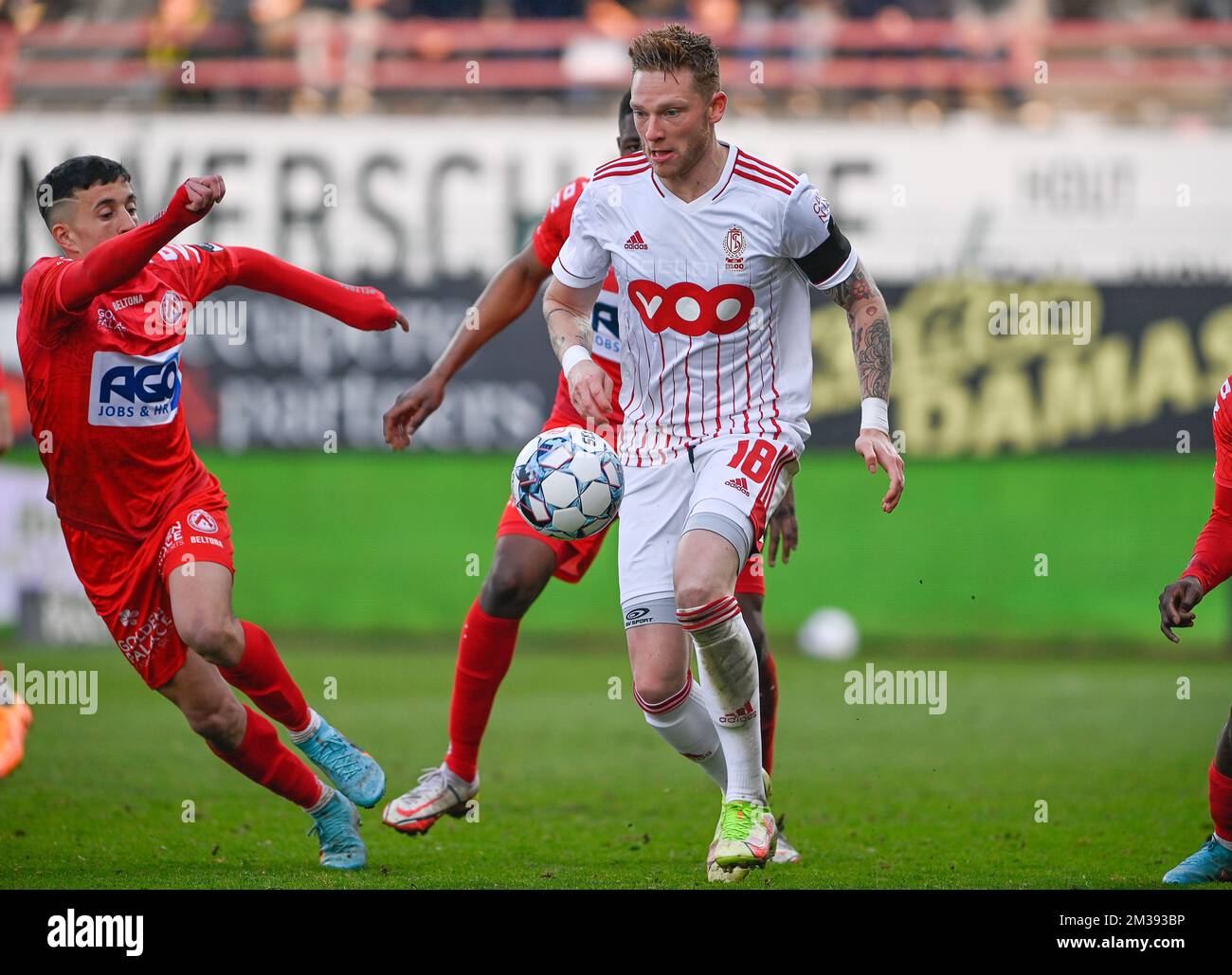 Kortrijk's Abdelkahar Kadri and Standard's Renaud Emond pictured in ...