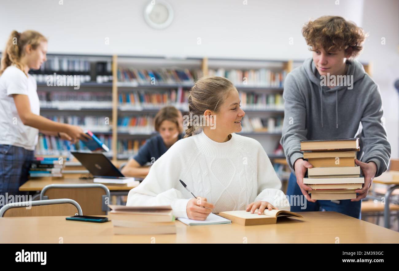Portrait of two schoolchildren preparing for lessons Stock Photo - Alamy