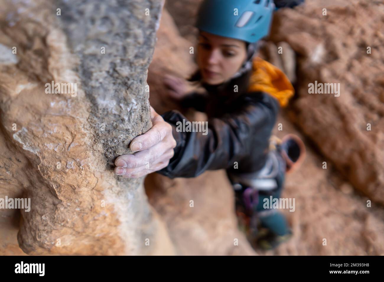 Girl is climbing on the rocks, closeup view on hand Stock Photo - Alamy