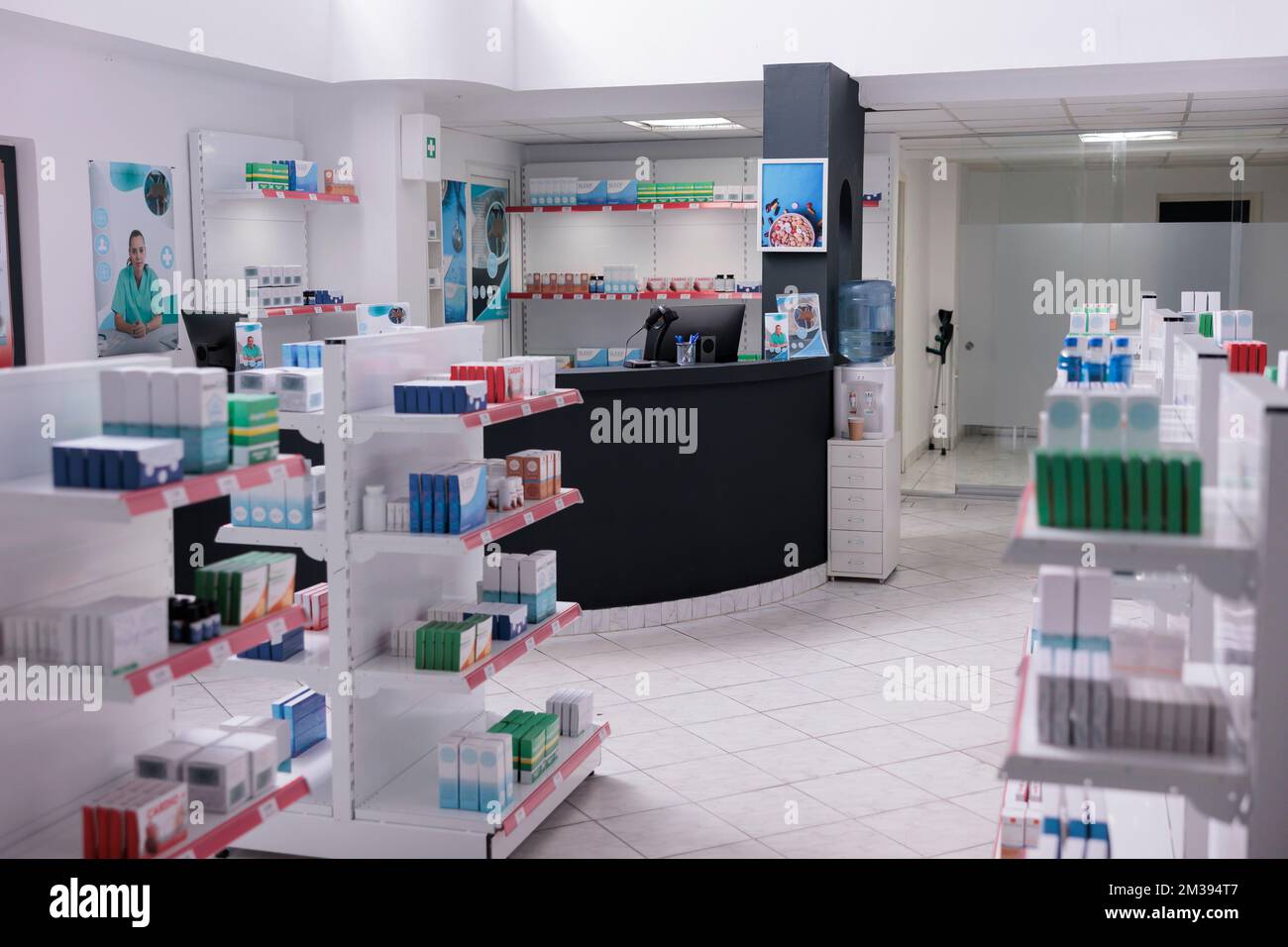 Modern empty pharmacy equipped shelves full of supplements, pills ...
