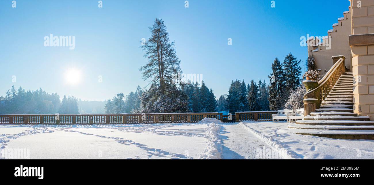 The winter snowy scenery of Pruhonice Castle and the Podzamecky pond in ...