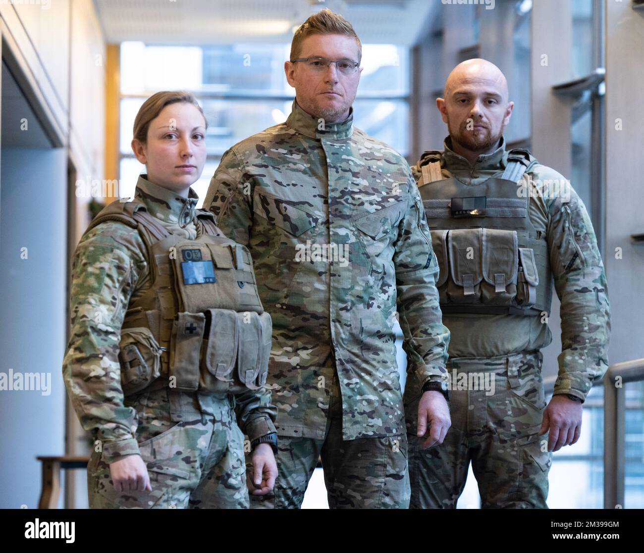Soldiers pose with new uniforms during a press moment to present the ...