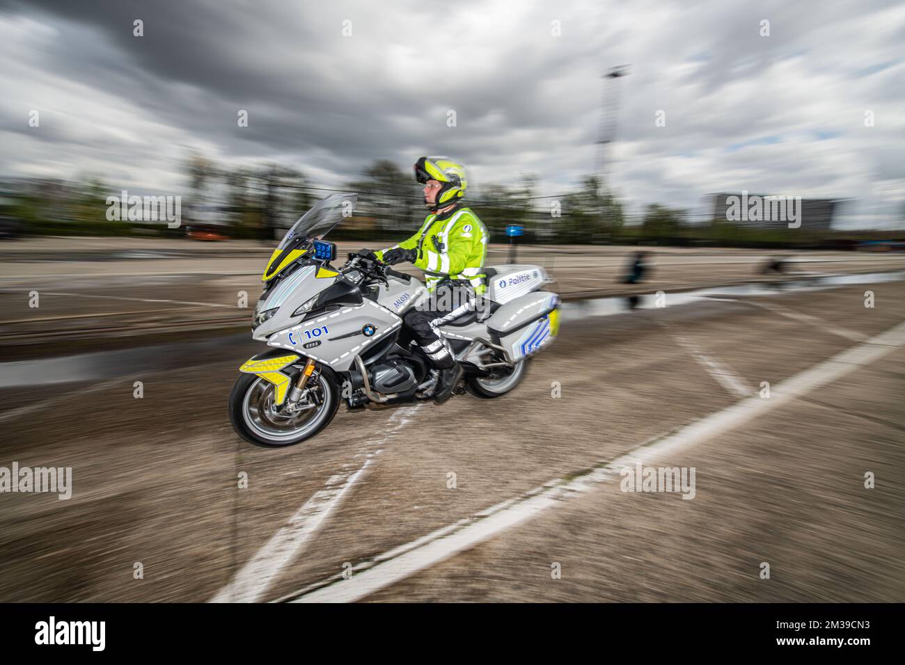 Illustration image shows a police officer on a motorcycle during a ... Illustration image shows a police officer on a motorcycle during a ...