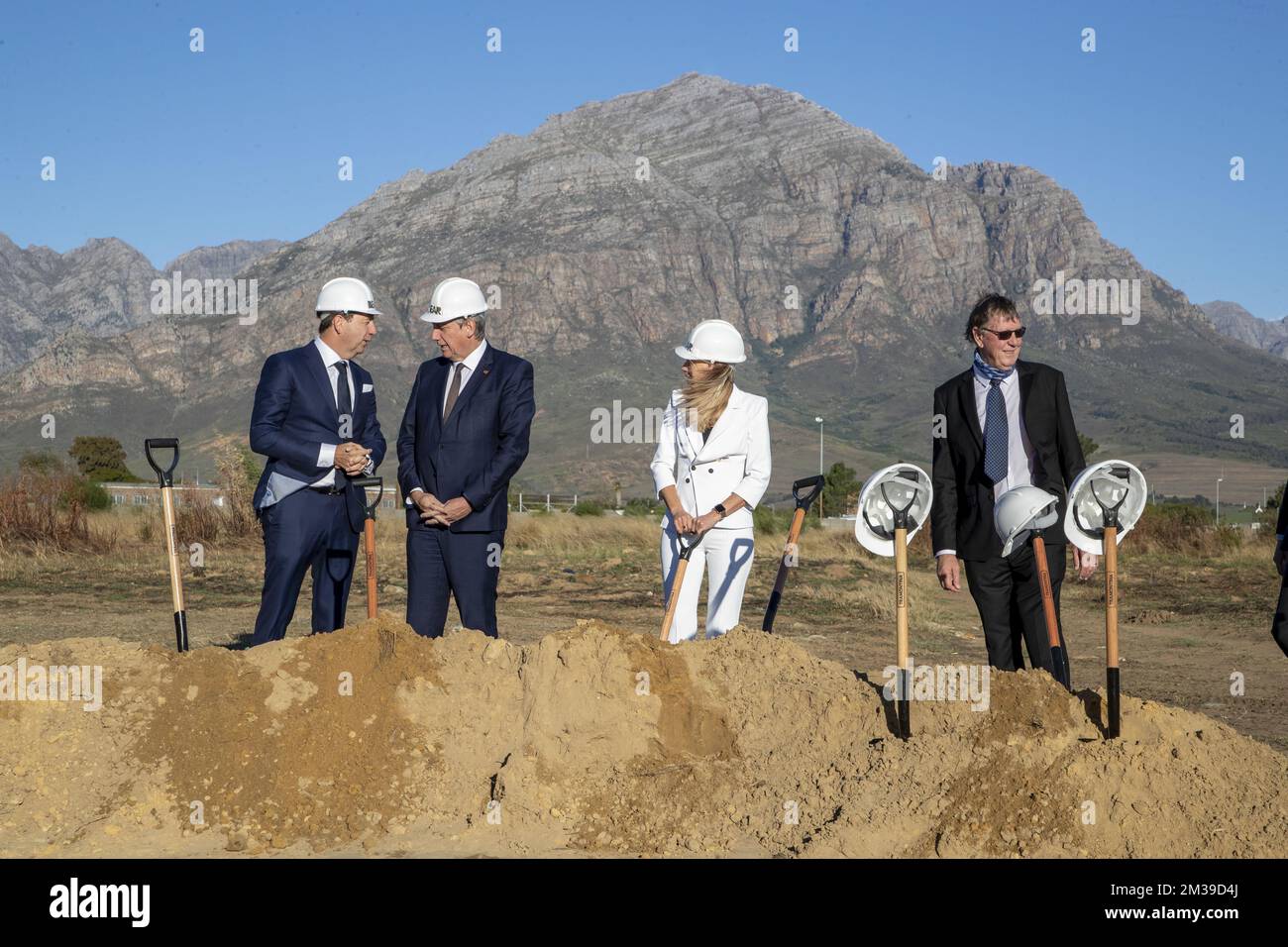 Lotus Bakeries CEO Jan Boone, Flemish Minister President Jan Jambon and ...