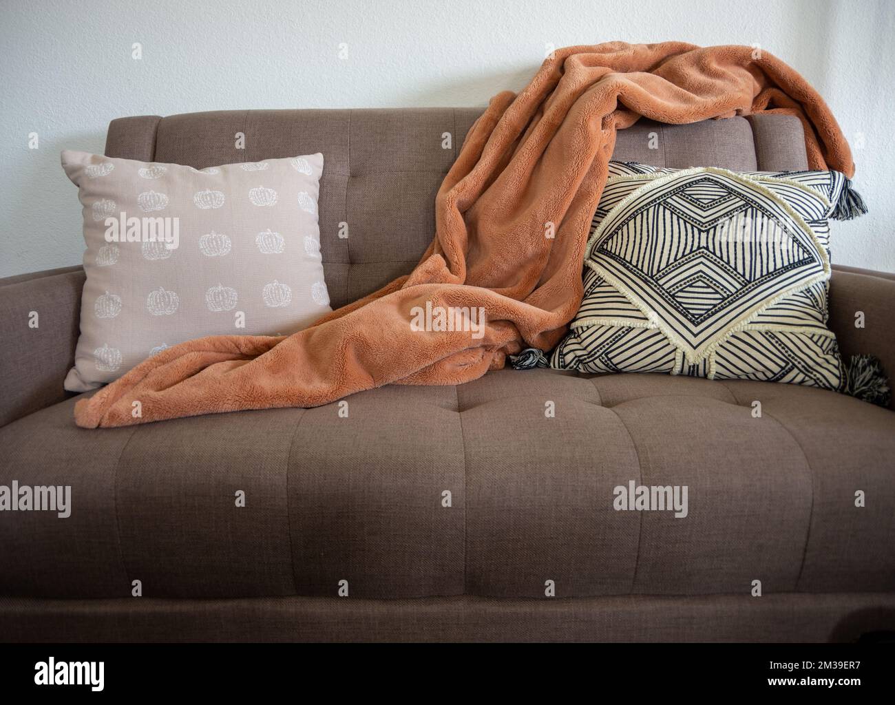 Fall interior design couch with throw pillows with pumpkin and orange ...
