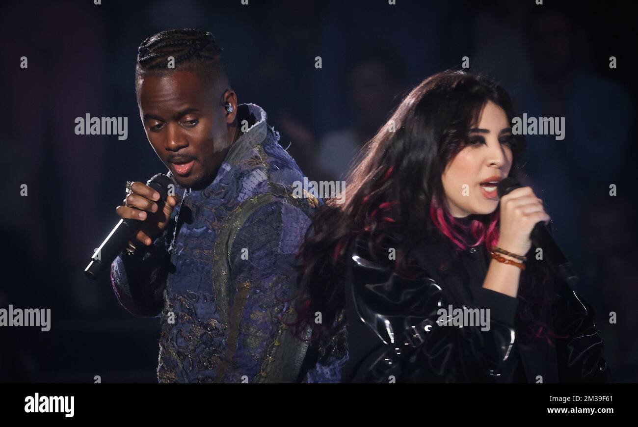 Finalist Sekina and her coach Black M perform at the final of ...