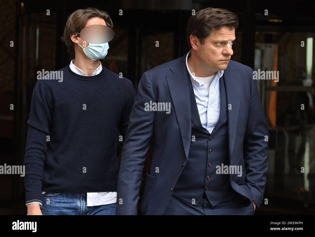 Lawyer Christian Clement and one of the accused pictured at the start ...