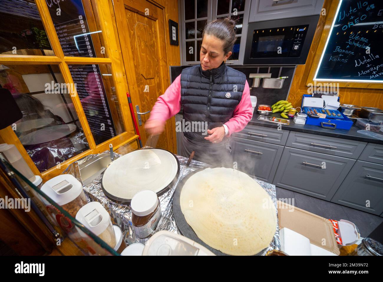 Preparation of a crepe at Christmas food markets, Potsdamer Platz ...
