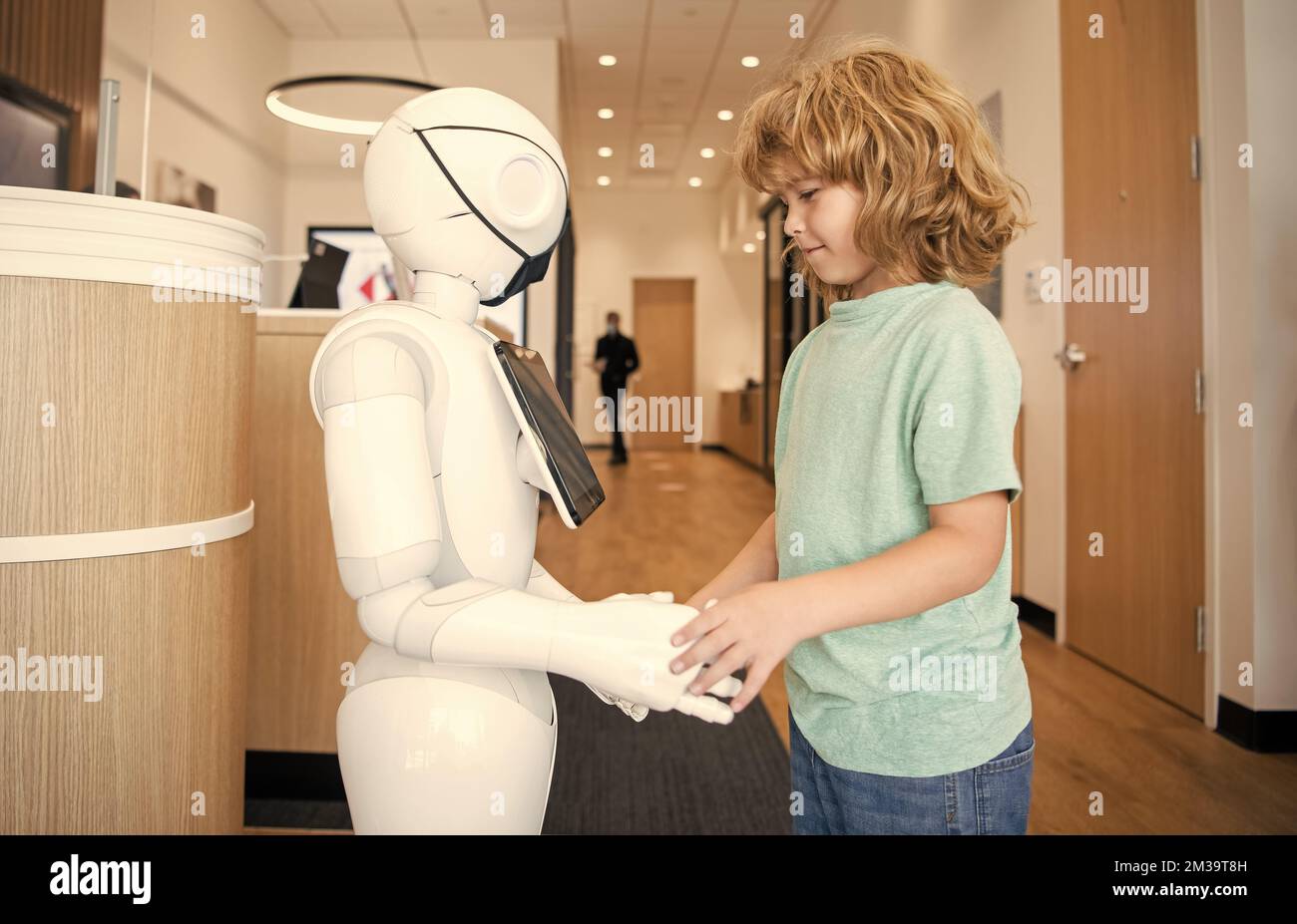 child interact with robot as innovative technology, communication Stock ...