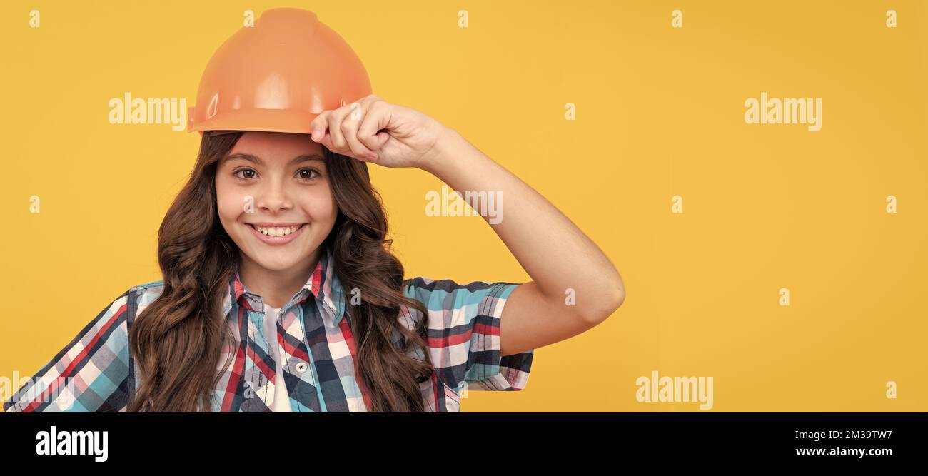 happy kid with curly hair in construction helmet, architect. Child ...