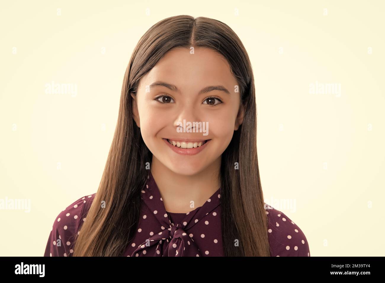 Portrait of happy smiling teenage child girl. Close-up portrait of girl teen face. Portrait of a ...