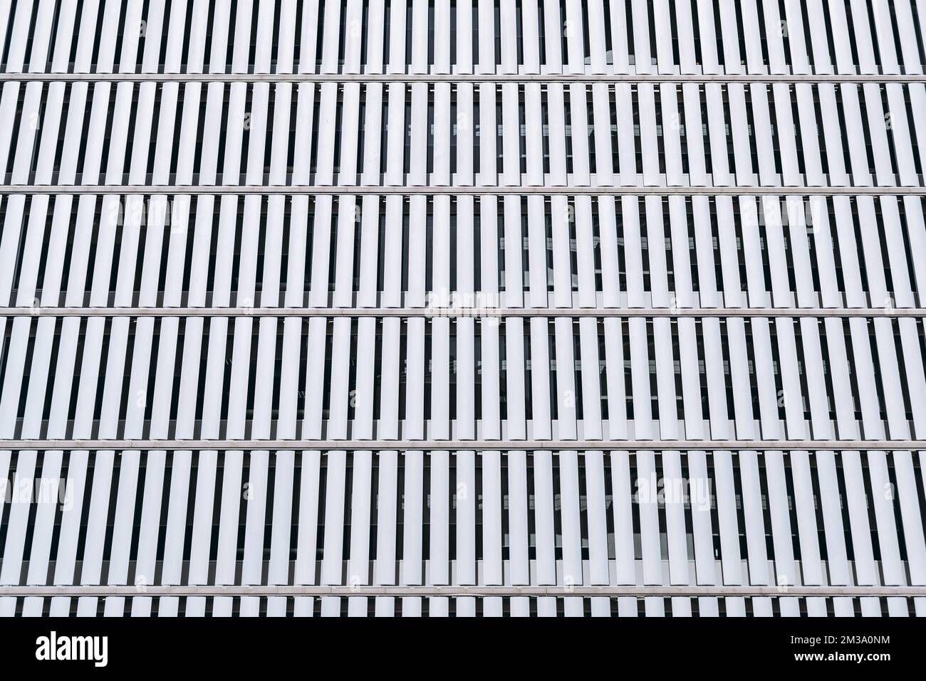 Ultra-modern facade of a building in a sequential pattern of ...