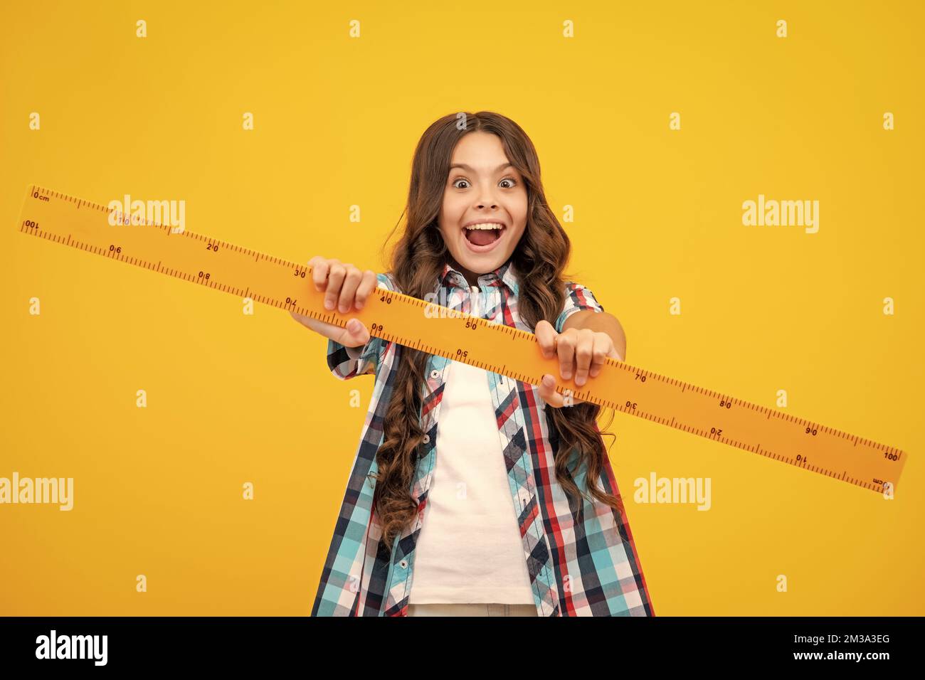 Amazed teen girl. Teenager school girl study math or geometry lesson ...